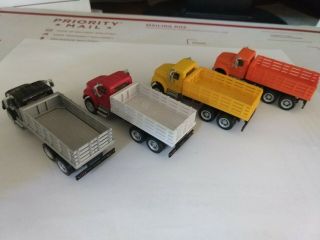 4 Boley HO Scale International Stake Bed Trucks | #20660510